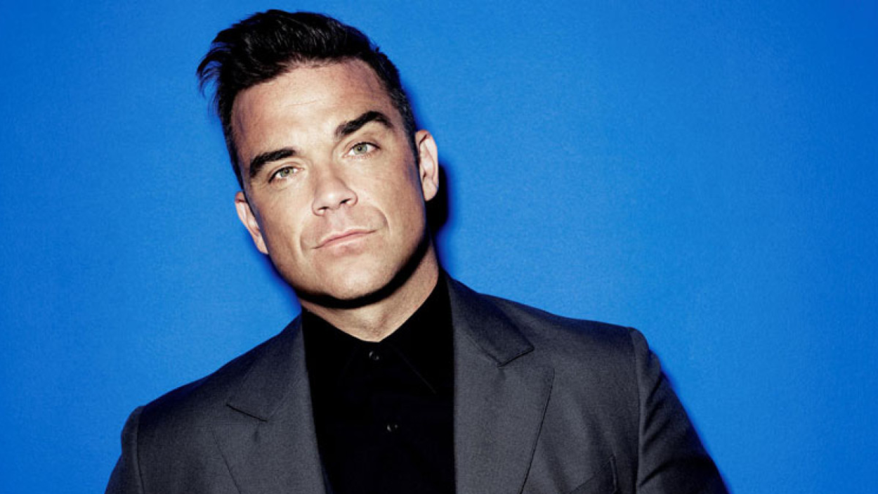 Robbie Williams Ungkap Ketakutan Saat Didekati Penggemar: "Saya Panik"